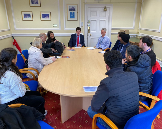 Asylum seekers and refugees get a tour of Cardiff City Hall - Welsh ...